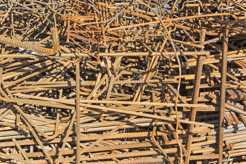 A pile of rusty iron rods stock image. Image of rods - 57104303