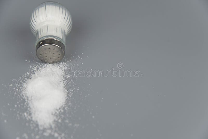 A Pile of Salt from Salt Shaker, Concept Excessive Salt Intake Stock ...
