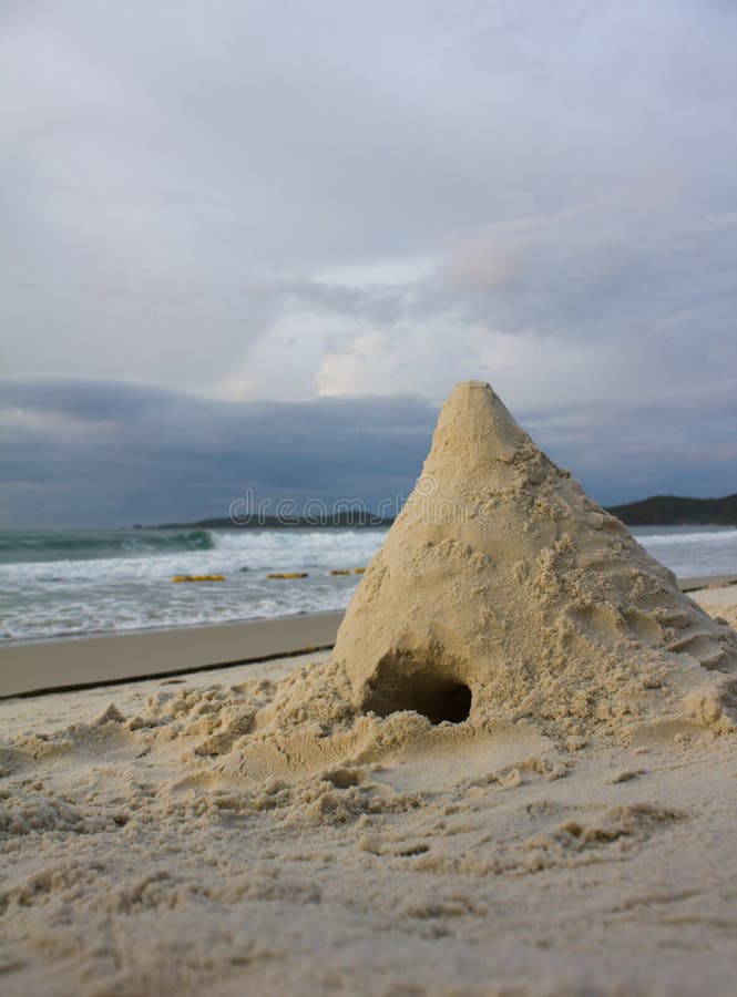 Pile of sand on the beach stock image. Image of beach - 35512675
