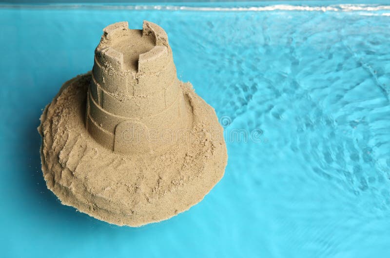 Pile of Sand with Tower on Rippled Water, Space for Text. Beautiful ...