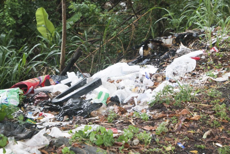 A pile of scattered trash stock image. Image of carelessly - 233674019 A pile of scattered trash stock image. Image of carelessly - 233674019