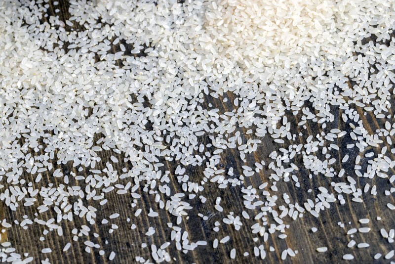 A Pile of Scattered White Rice on the Kitchen Table Stock Photo - Image ...