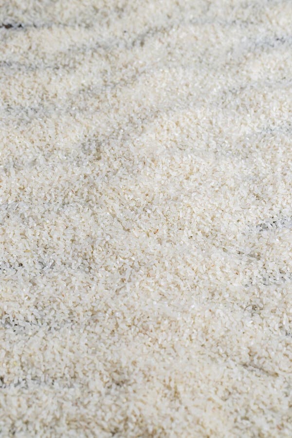 A Pile of Scattered White Rice on the Kitchen Table Stock Image - Image ...
