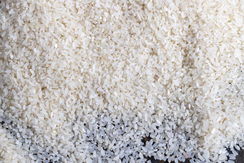 A Pile of Scattered White Rice on the Kitchen Table Stock Photo - Image ...