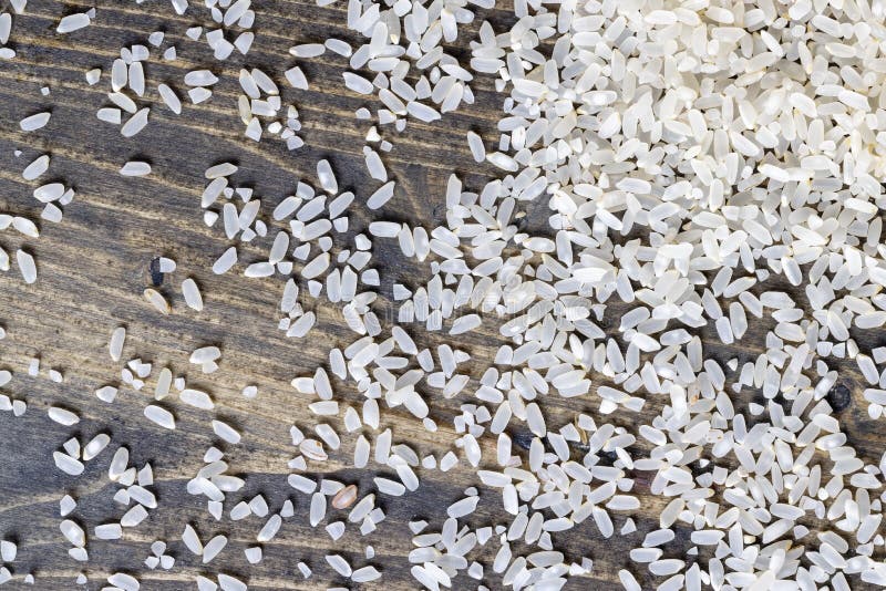 A Pile of Scattered White Rice on the Kitchen Table Stock Image - Image ...