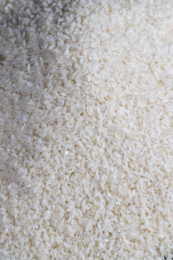 A Pile of Scattered White Rice on the Kitchen Table Stock Image - Image ...