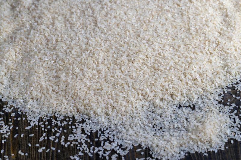 A Pile of Scattered White Rice on the Kitchen Table Stock Photo - Image ...