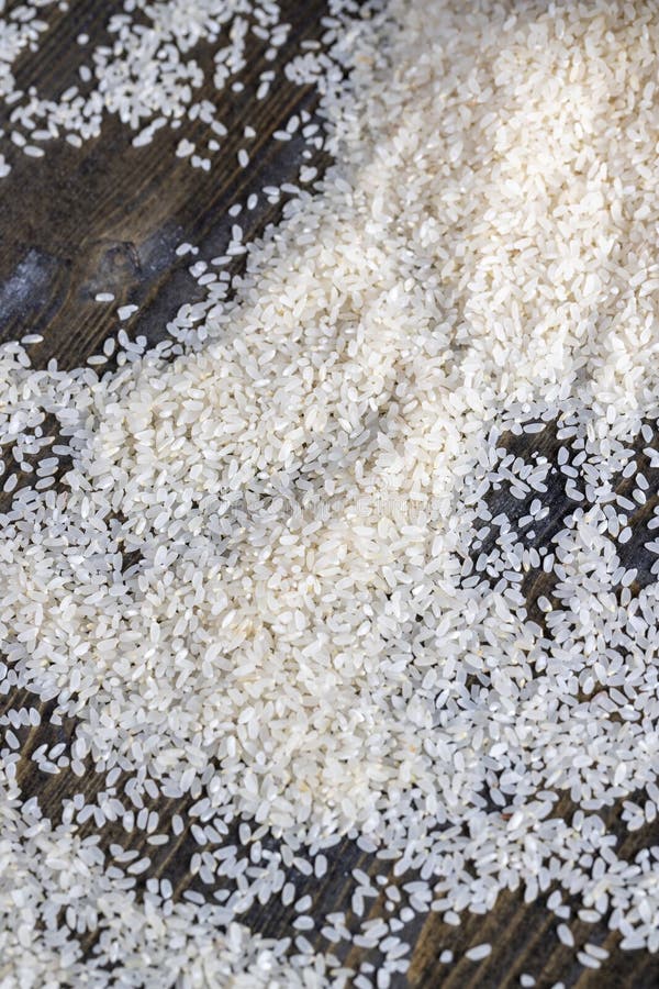 A Pile of Scattered White Rice on the Kitchen Table Stock Photo - Image ...