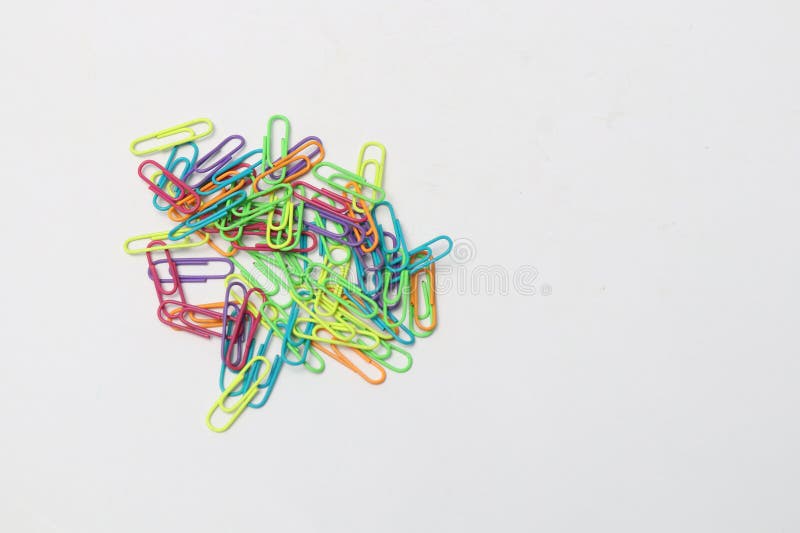 A Pile of Several Colorful Paper Clips. a Tool for Clamping and Joining ...