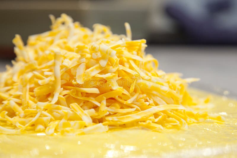 Pile of shredded cheese stock image. Image of yellow, orange - 2684187