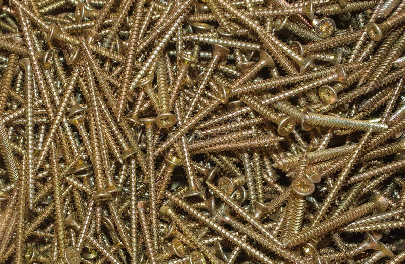A Bunch of Screws Stacked on Top of Each Other Stock Image - Image of ...