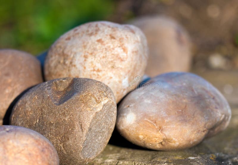 Pile of Smooth Stones in Warm Morning Light Stock Image - Image of ...