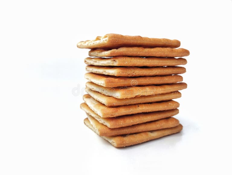 Pile of Square Cracker Biscuit Isolated on White Background Stock Photo ...