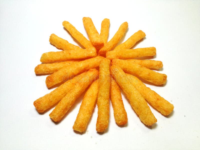 A Pile of Stick Chips in a Room with White Background Stock Photo ...