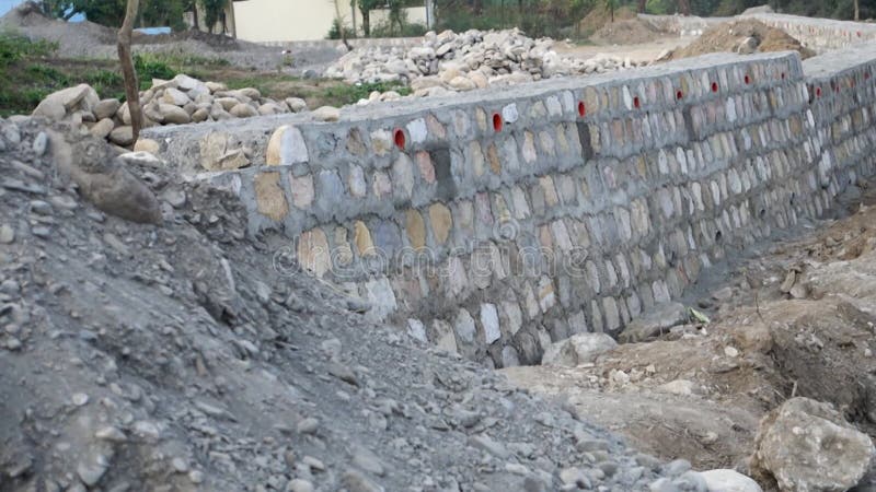 A Pile of Stone Alongside Road for Constructing a Stone Retaining Wall ...