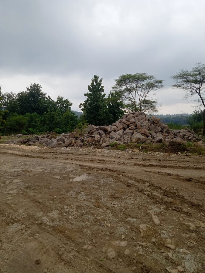 A Pile of Stone at the Side of the Road Stock Photo - Image of side ...