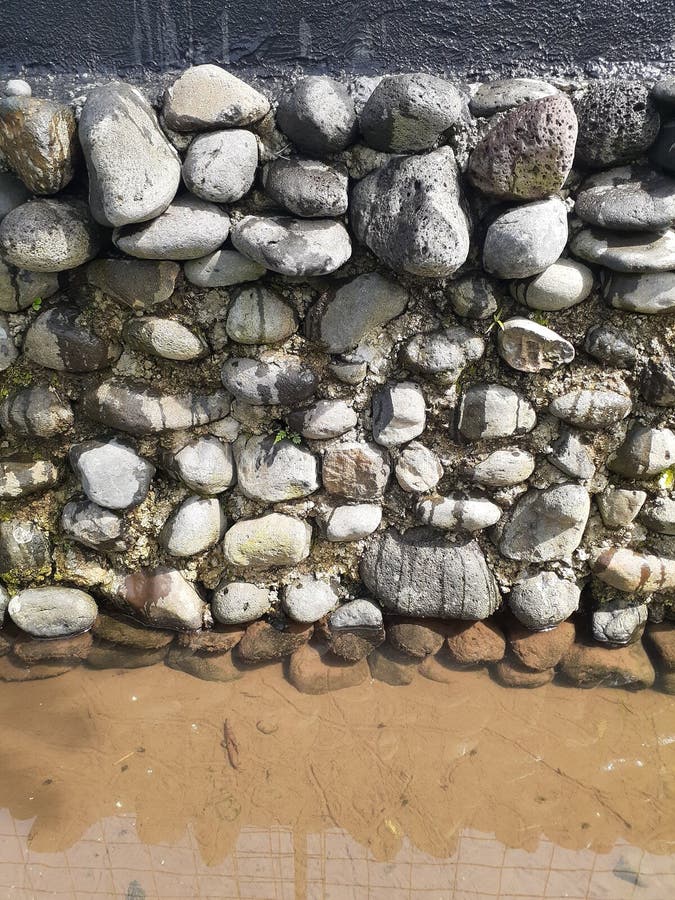 Pile of Stones on the River Bank Stock Photo - Image of pile, river ...