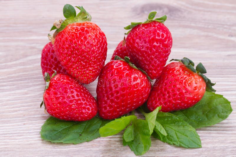 Pile of Strawberry on Wooden Table Stock Photo - Image of colorful ...