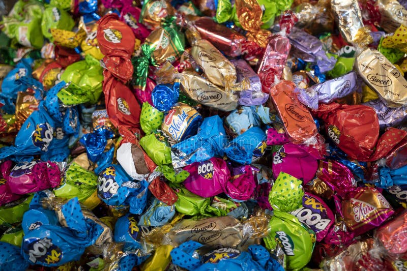 A Pile of Sweet Candy with Colorful Packagings and Wrappers Stock Photo ...