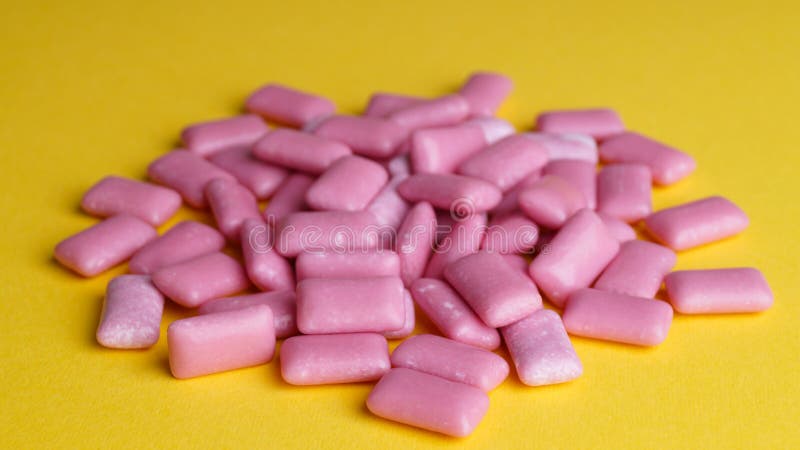 Pile of Sweet Chewing Gums on Yellow Background Stock Image - Image of ...