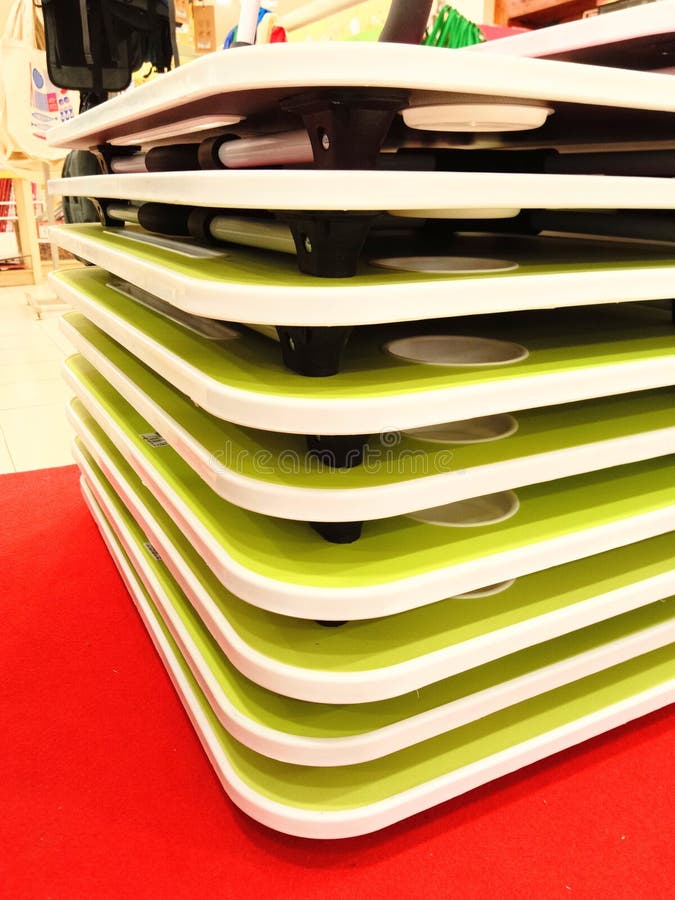 Pile of Table on the Red Table so Colourful Stock Image - Image of ...