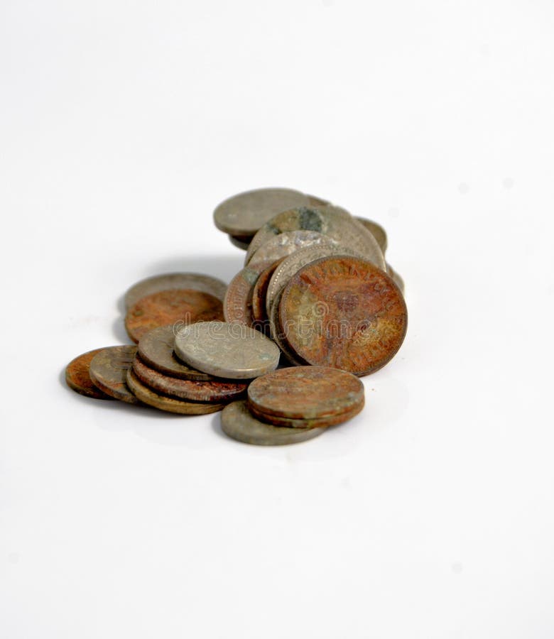 A Pile of Tarnished and Partially Corroded Coins Stock Photo - Image of ...