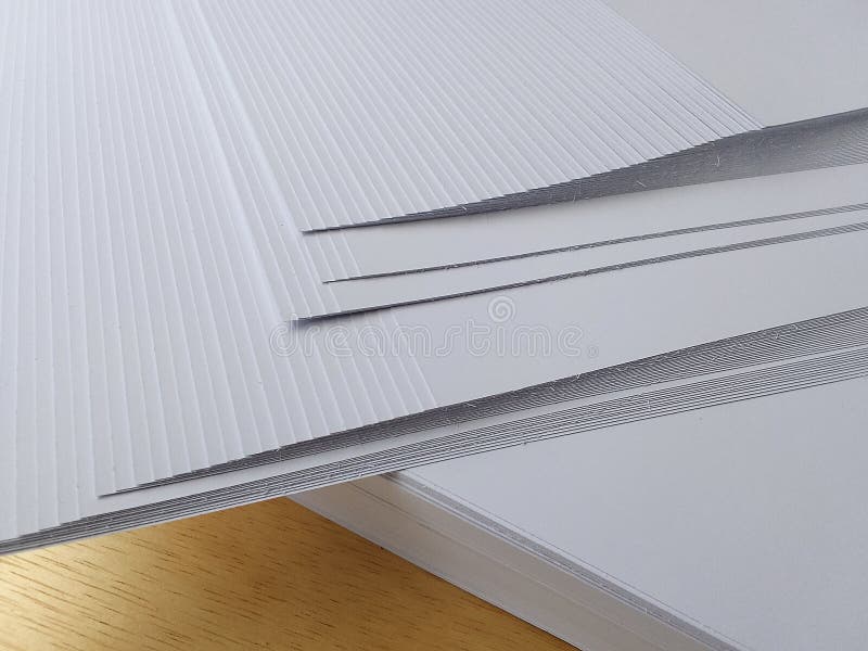 Pile of thick white paper stock photo. Image of color - 316584822
