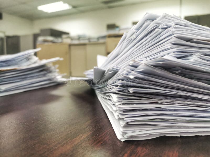 Pile of Unfinished Documents on the Office Desk, Stack of Business ...