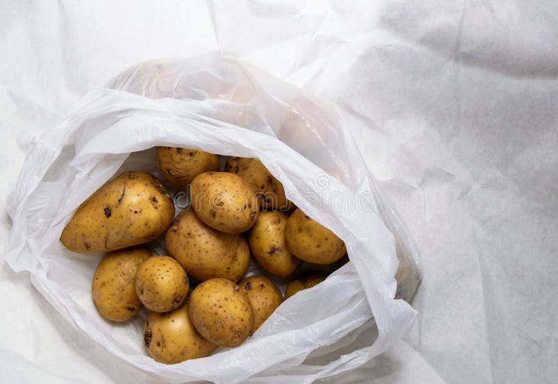 A Pile of Unwashed Potatoes Lies in a Bag Stock Photo - Image of health ...