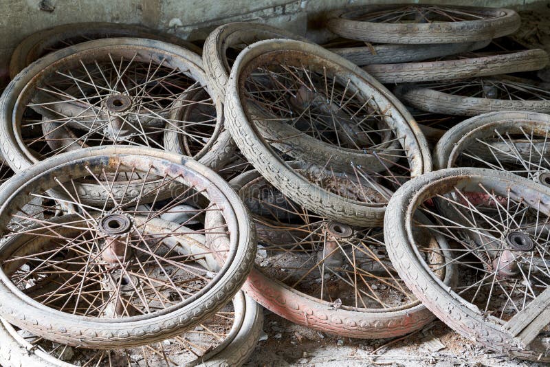 Pile of Used Bicycle Wheels in an Abandoned Garbage Dump Stock Image ...