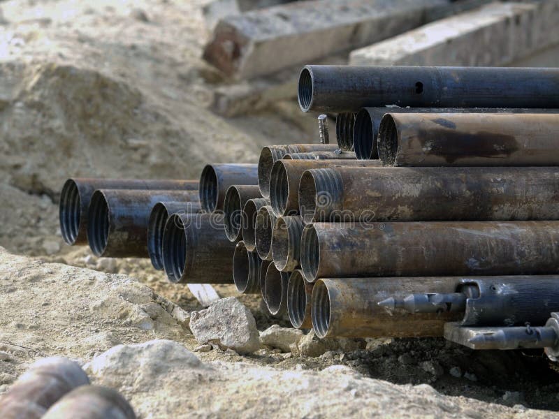 Pile of Used Drilling Pipes Stock Photo - Image of used, industry ...