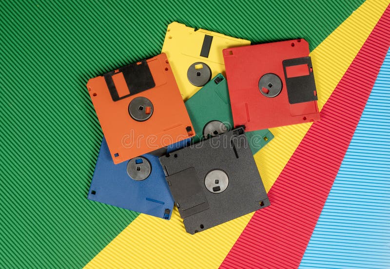 Pile of Vintage Floppy Disks in Multi-colored Theme Technology ...