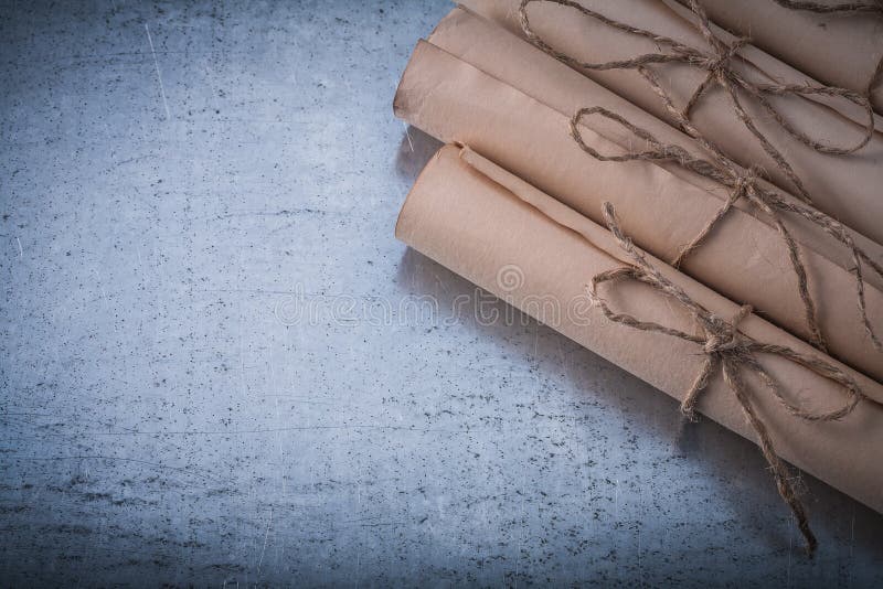 Pile of Vintage Paper Rolls on Scratched Metallic Stock Image - Image ...