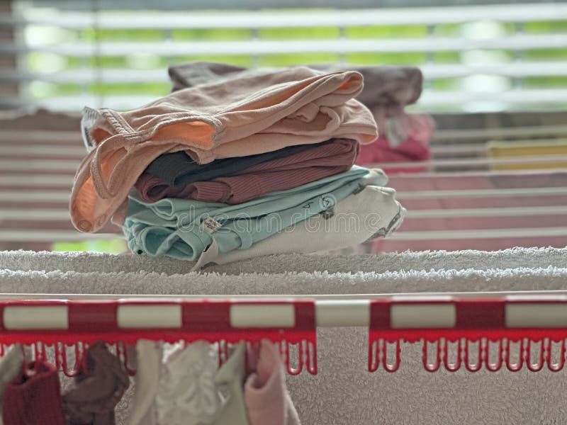 A Pile of Washed Dried Clothes Stacked Stock Image - Image of neat ...