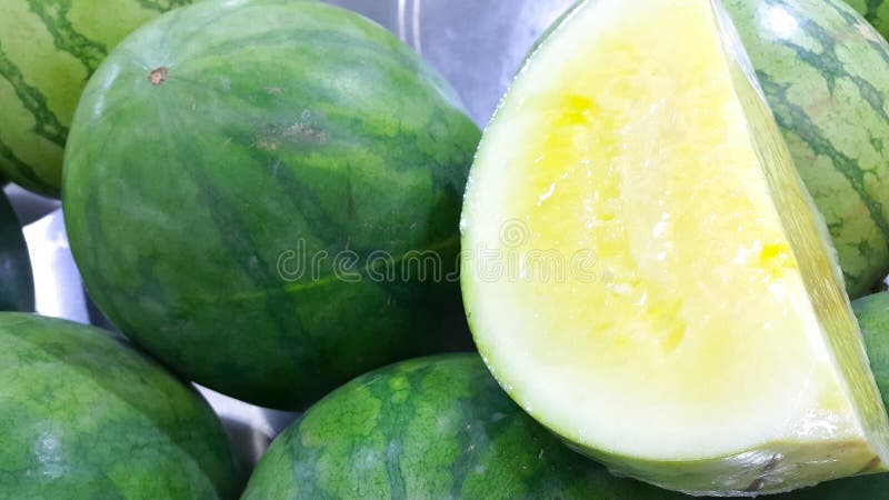 Pile of Watermelons. Yellow Watermelons Stock Photo - Image of ...