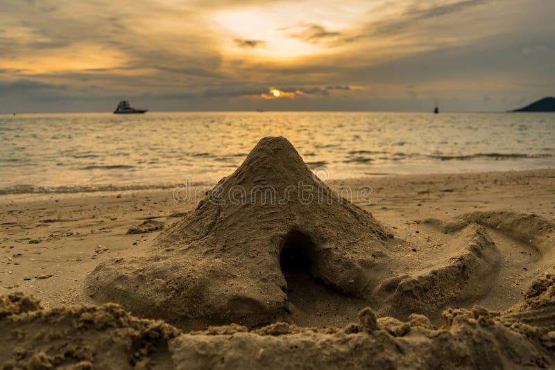 Pile of Wet Sand on the Beach at Sunset Stock Image - Image of shore ...