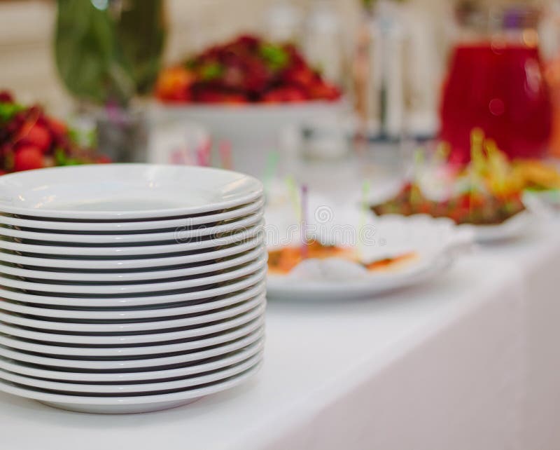 Pile of White Plates on Catering Buffet. Stock Photo - Image of buffet ...