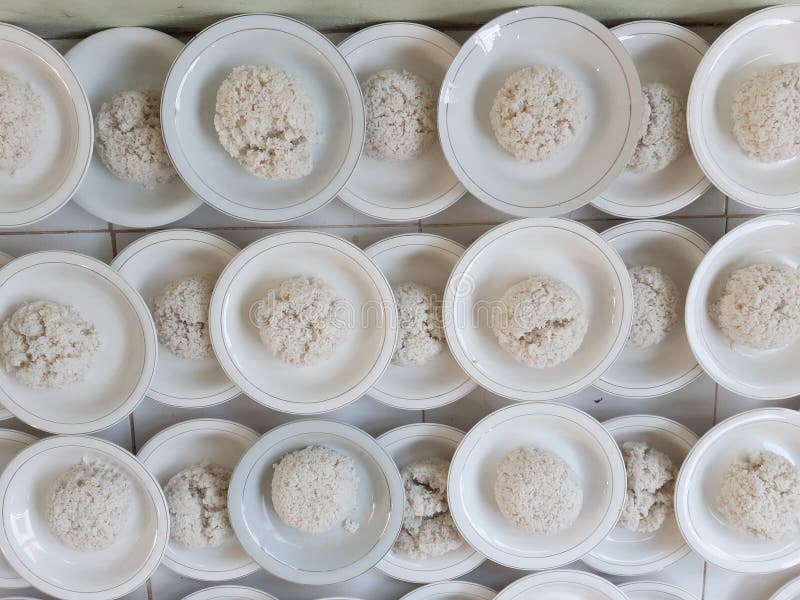 Pile of White Plates in the Kitchen To Put Rice and Side Dishes Stock ...