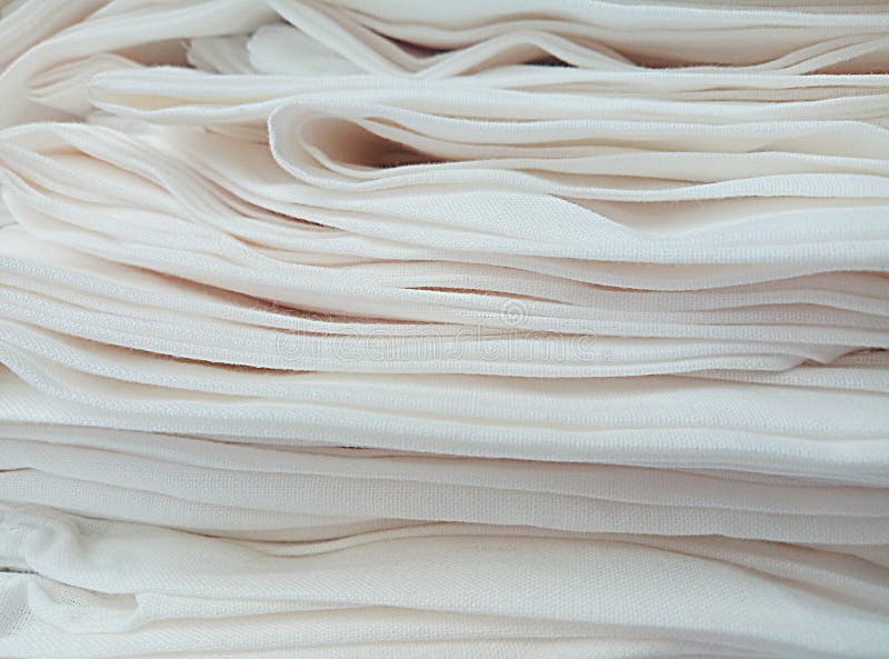 Pile of white rayon cloth stock photo. Image of partially - 178562988