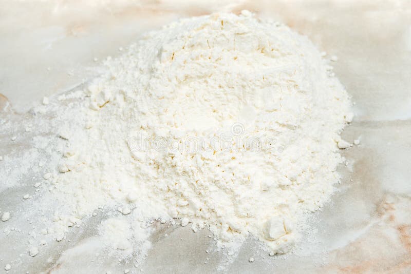 Pile of flour on the table stock photo. Image of baking - 111342868