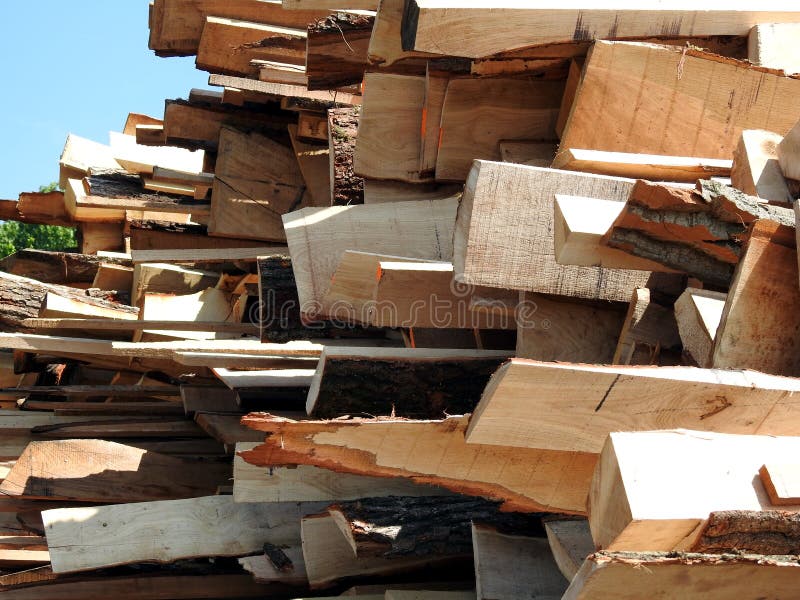 Pile of sawed wood planks stock photo. Image of material - 36939950