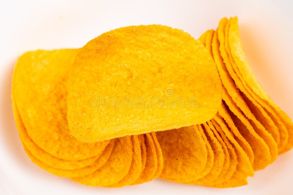A pile of yellow chips stock photo. Image of yellow - 352800976