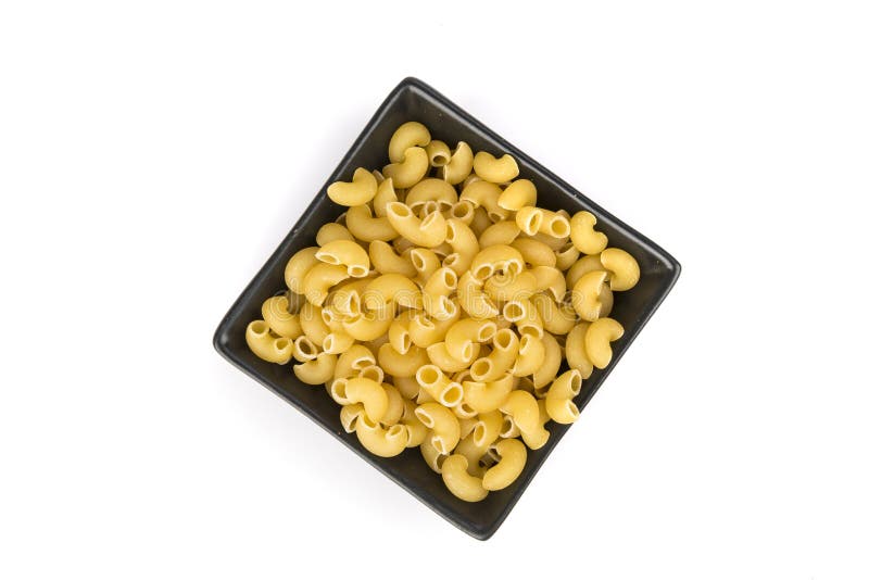 PIle of Yellow Dried Elbow Macaroni Pasta Shapes Stock Image - Image of ...