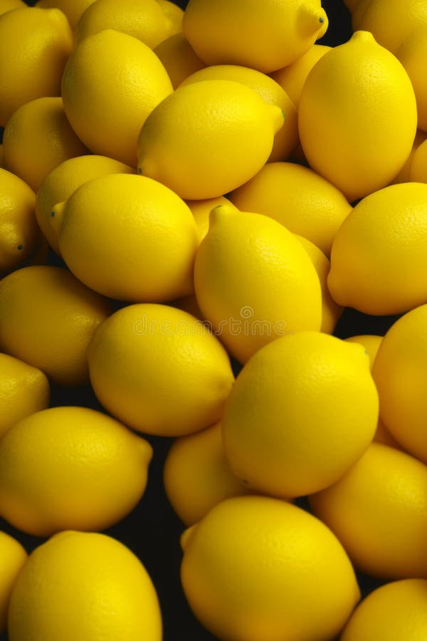 Pile of Yellow Lemons Sitting on Top of Black Counter Top. Generative ...