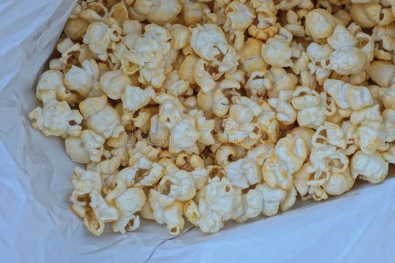 Yellow Popcorn in White Bag Stock Photo - Image of salt, classic: 330635116