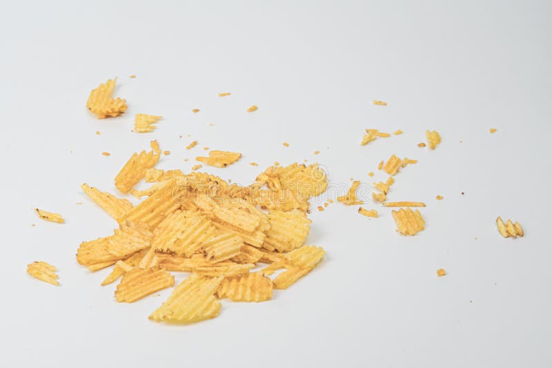 A Pile of Yellow Potato Chips, Varying in Size and Shape, Scattered on ...