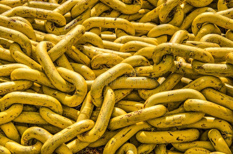 Yellow steel chains stock image. Image of chain, hefty - 127695683