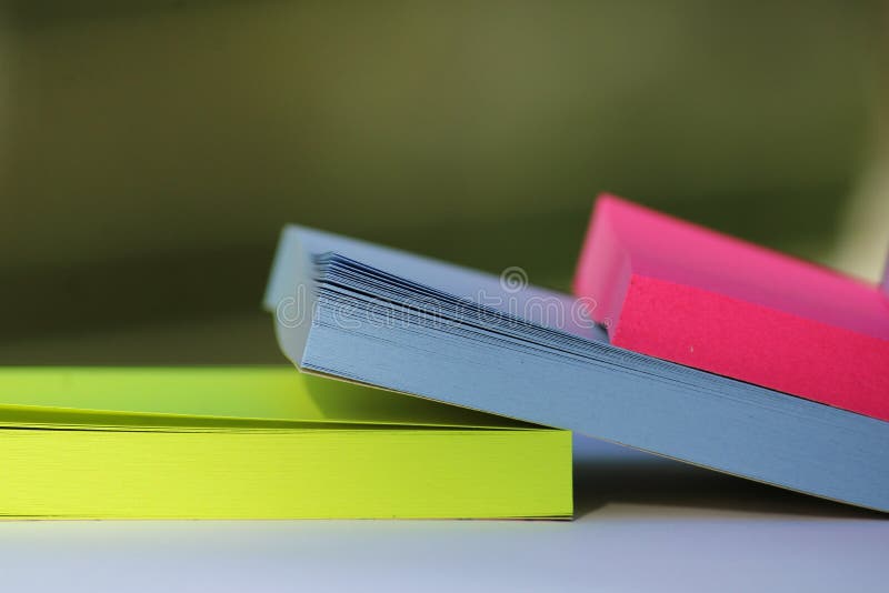 Piled Bright Colored Sticky Note Blocks; Green, Blue, Pink and Purple ...