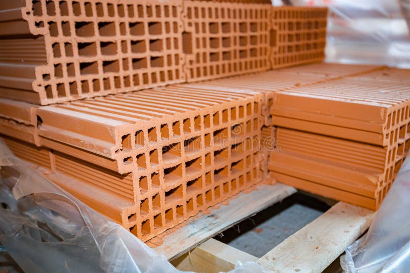 Piled Red Blocks, Packed in Opened Plastic Foil Stock Image - Image of ...