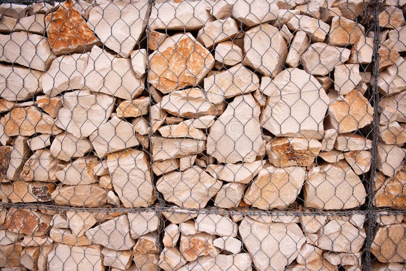 Piled Stones Enclosed in Wire Mesh for Construction Stock Photo - Image ...